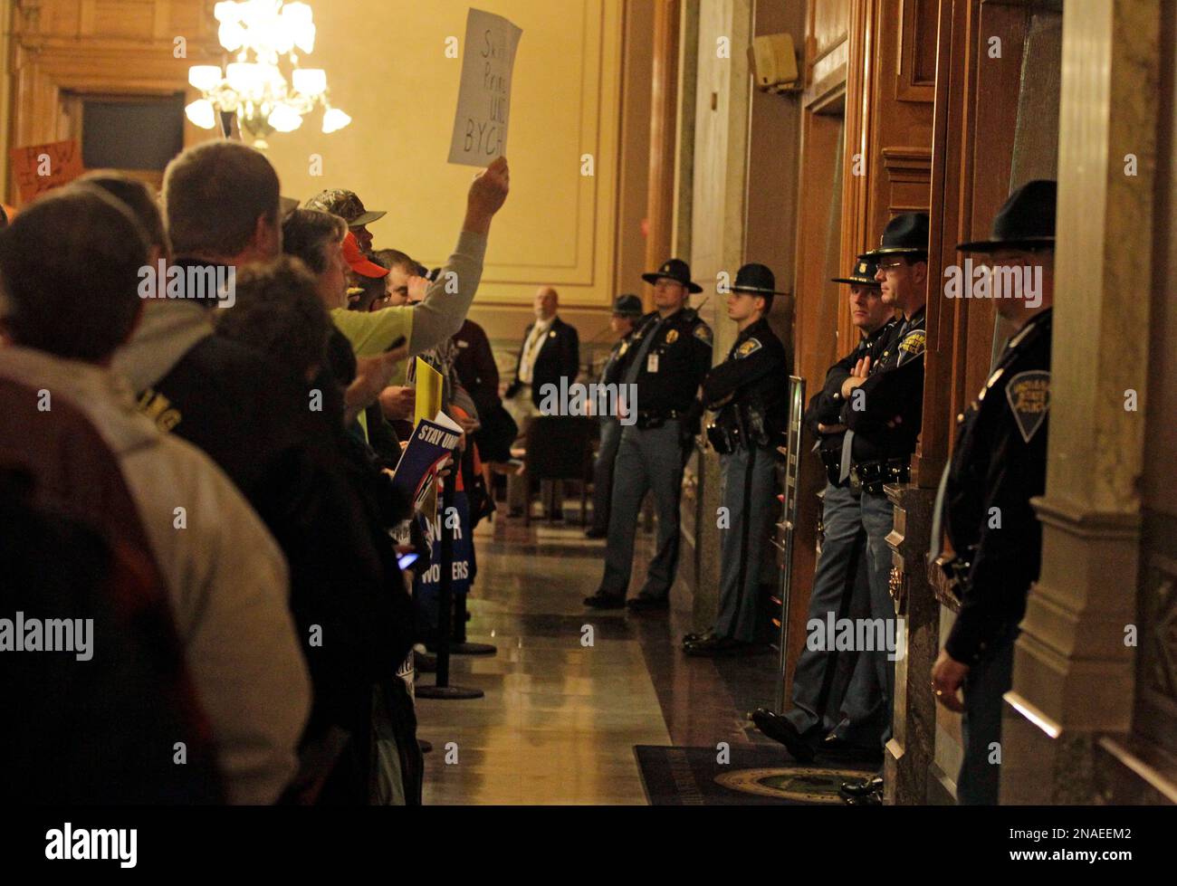 The Indiana State Police troopers stand outside of the House Cambers ...