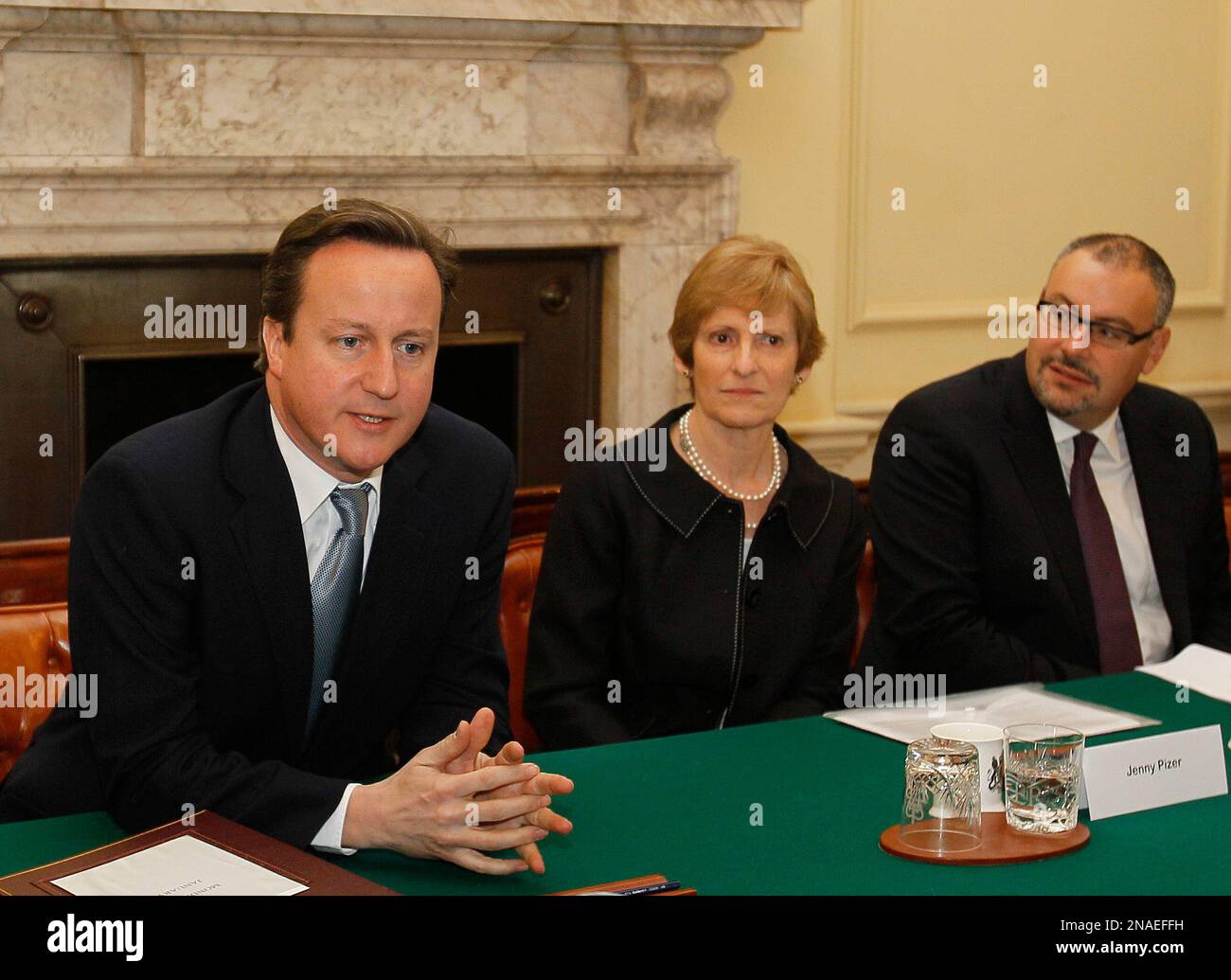 Britain's Prime Minister David Cameron, left, with Jenny Pizer and ...