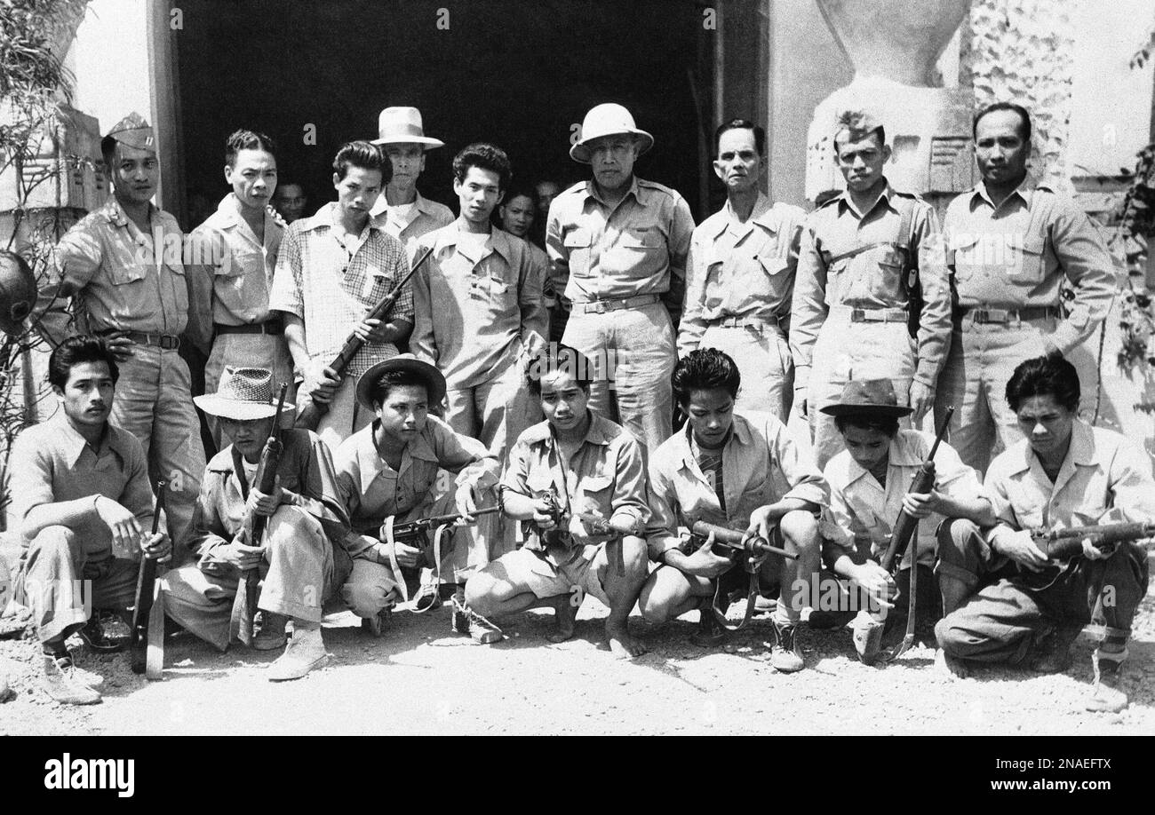 Brig. Gen. Mariano Castaneda (standing wearing sun helmet in center ...