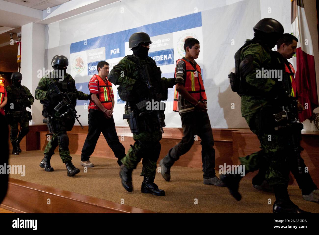 Members of an alleged gang that was arrested after a gun-battle that ...