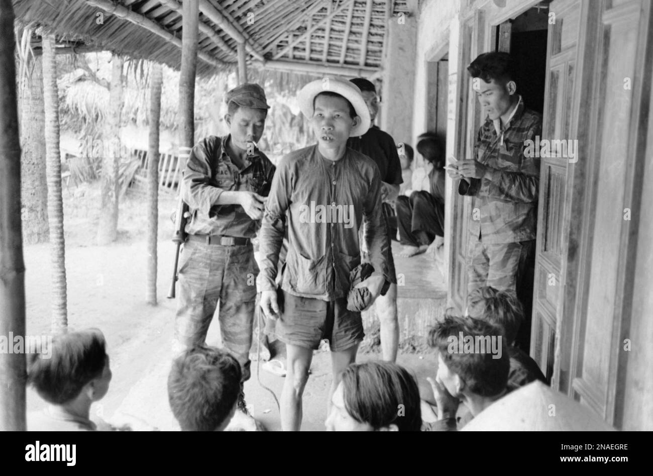 Two suspected Viet Cong guerrillas captured in fighting in the Binh ...