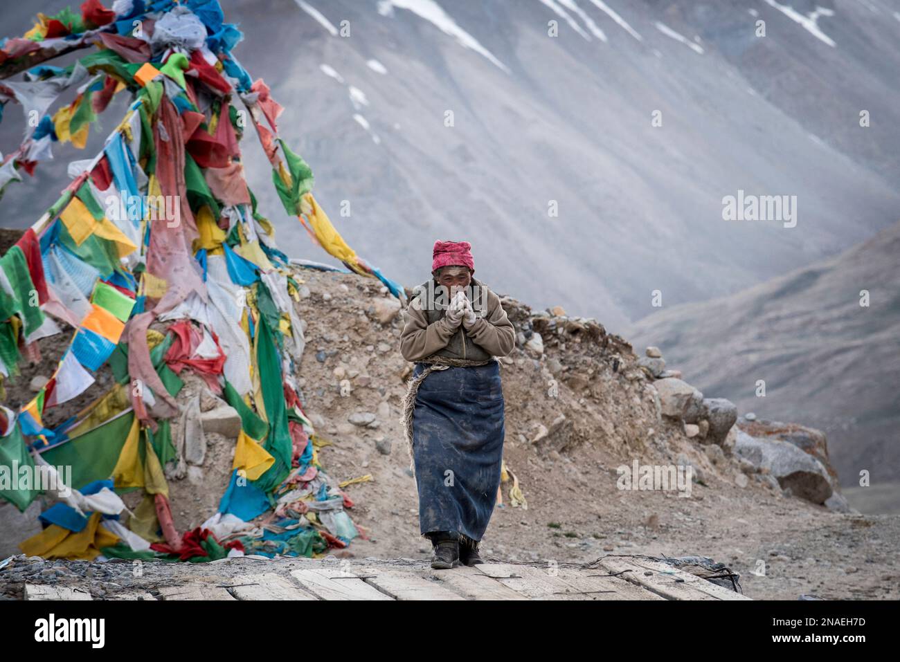 Pilgrim starting on the Kora pilgrimage at Mount Kailash; Tibetan ...