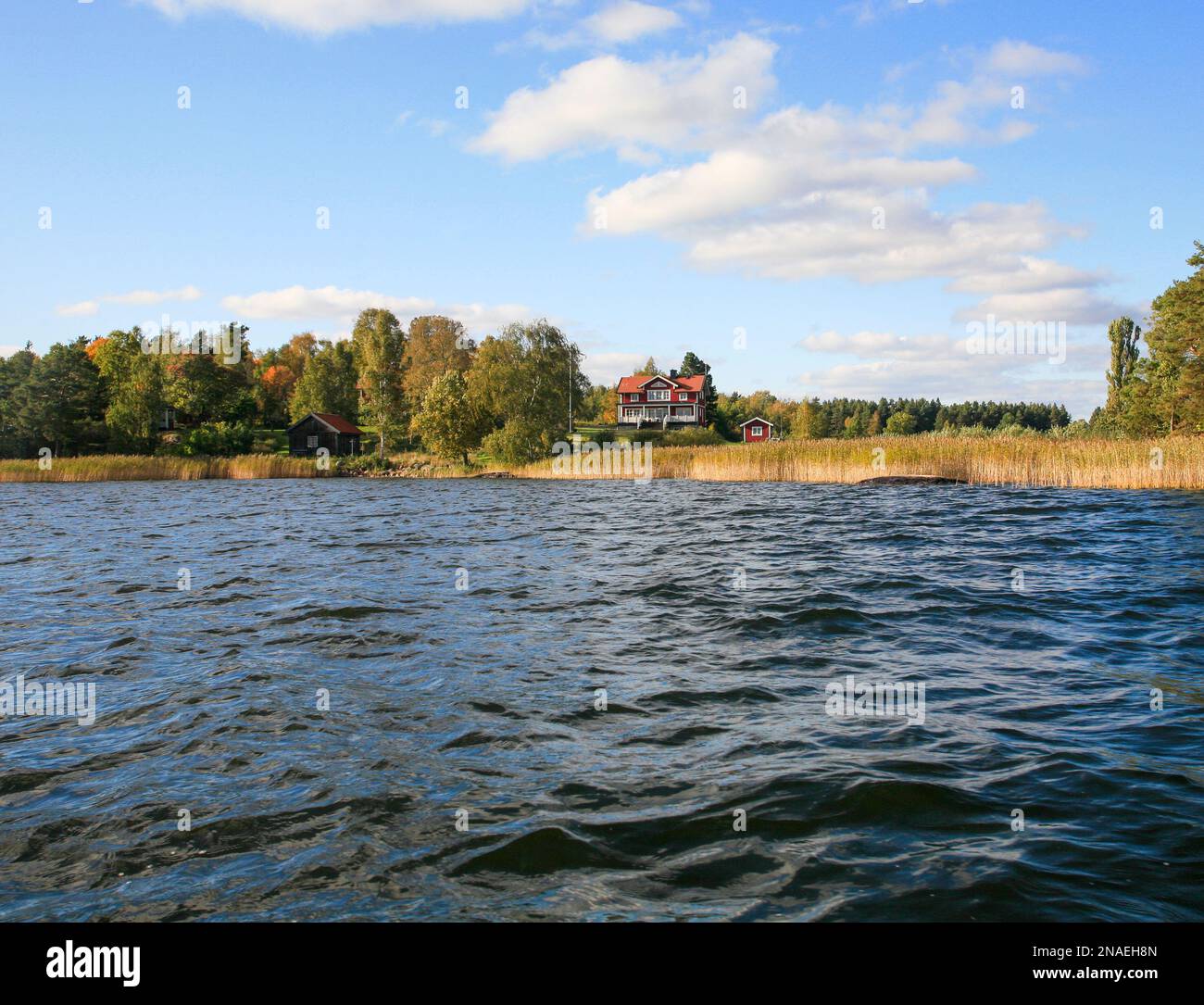 Villa by lake Båven in Södermanland at late summer landscape Stock ...