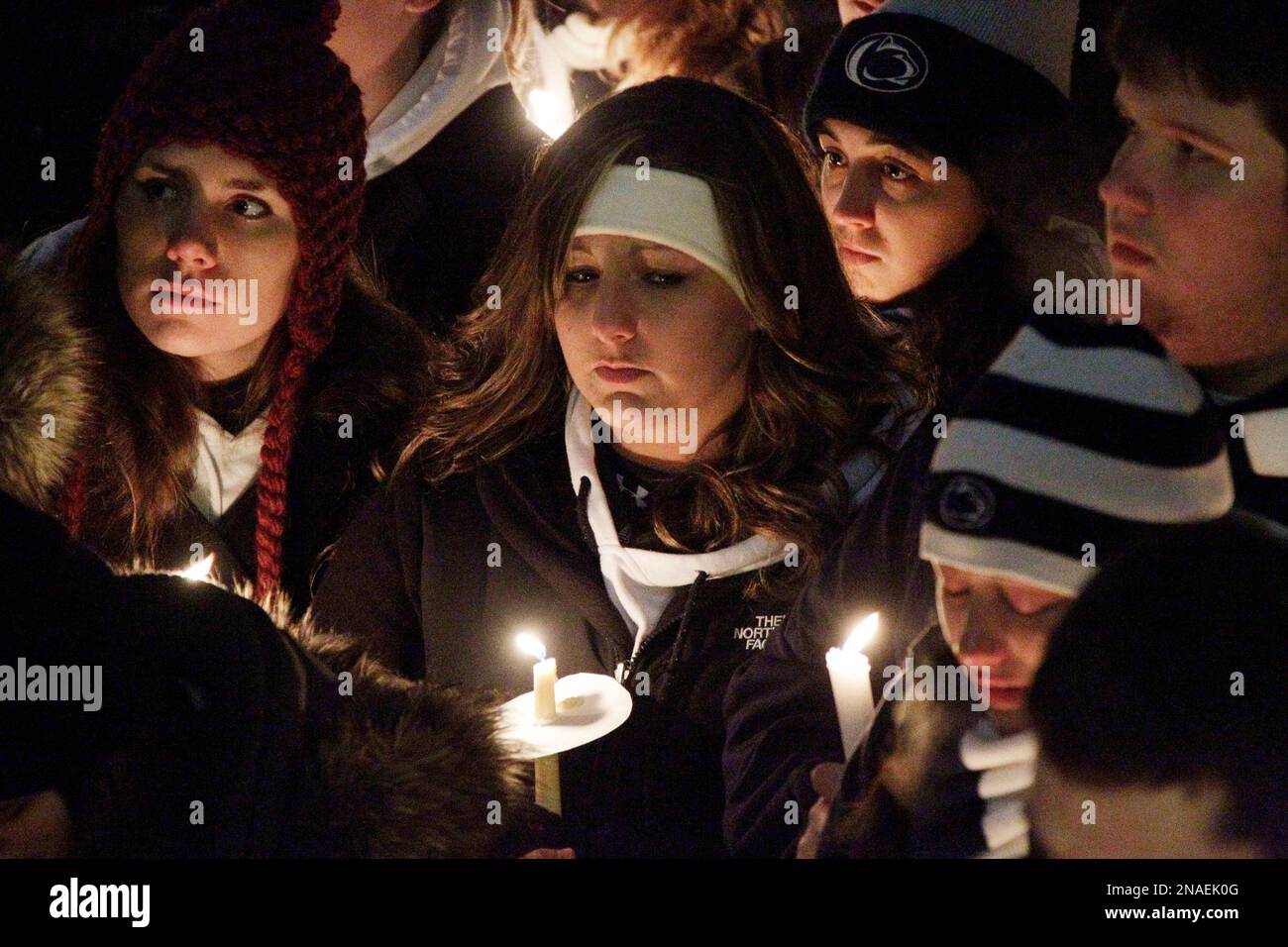 A candle light memorial honoring legendary football coach Joe Paterno ...