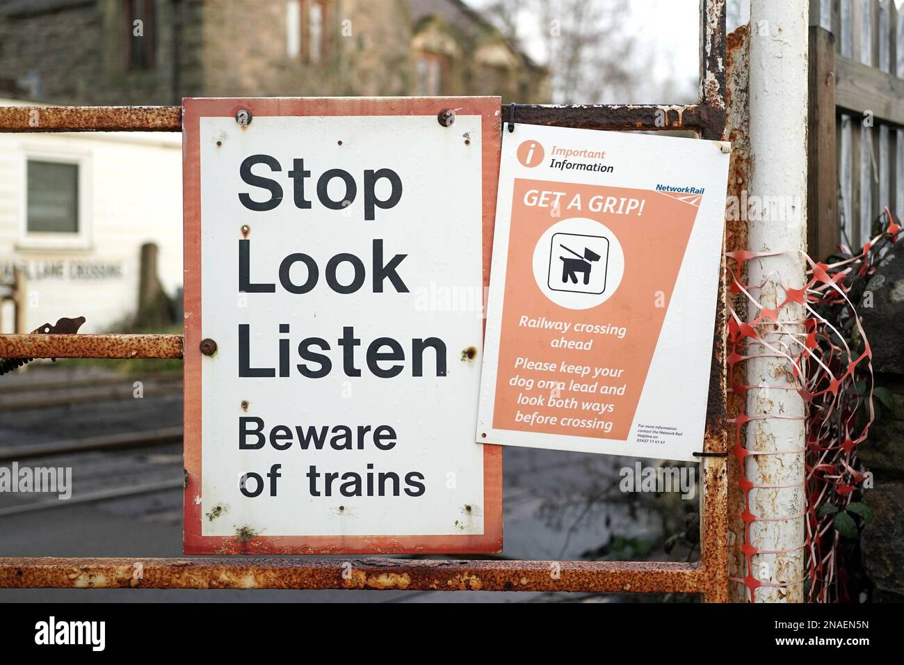 Warning notice. Fast train passing a Stop sign at an unprotected level ...