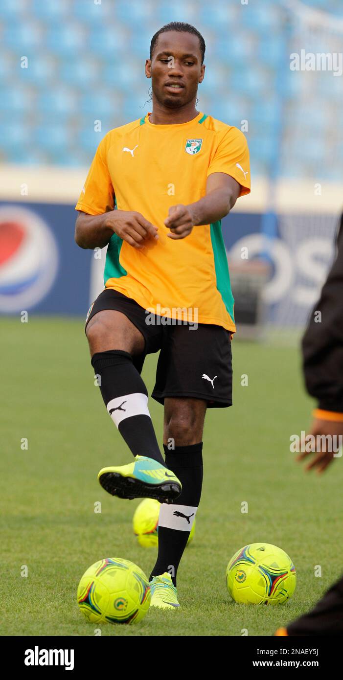 Ivory Coast captain Didier Drogba kicks a ball during a training ...