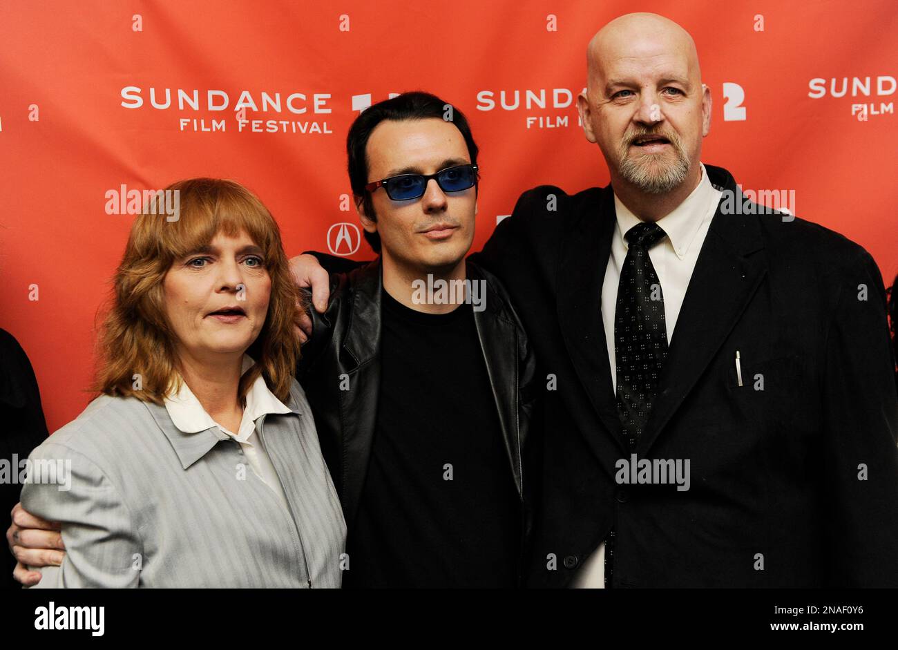 Damien Echols, center, a producer of the film "West of Memphis," poses ...