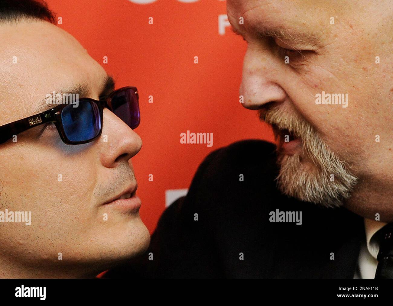 Damien Echols, left, a producer of the film "West of Memphis," mingles ...