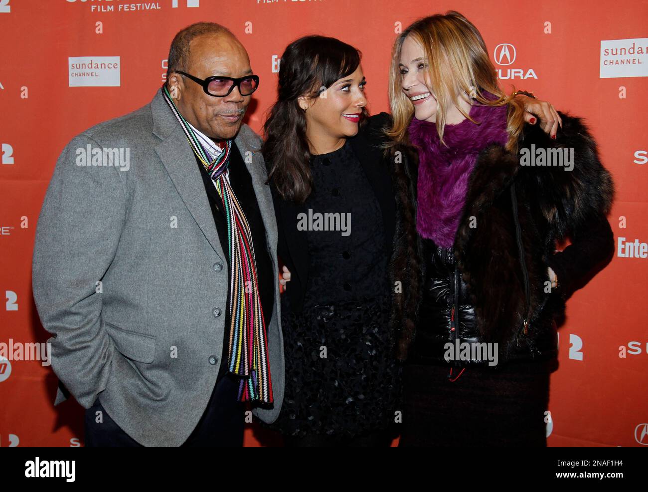 Actress Rashida Jones, center, poses with her father Quincy Jones, left ...