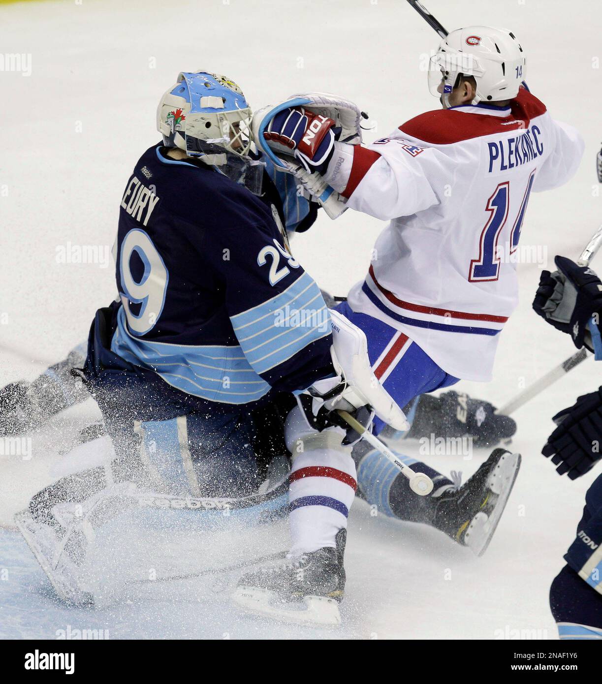 Pittsburgh Penguins goalie Marc-Andre Fleury (29) collides with ...