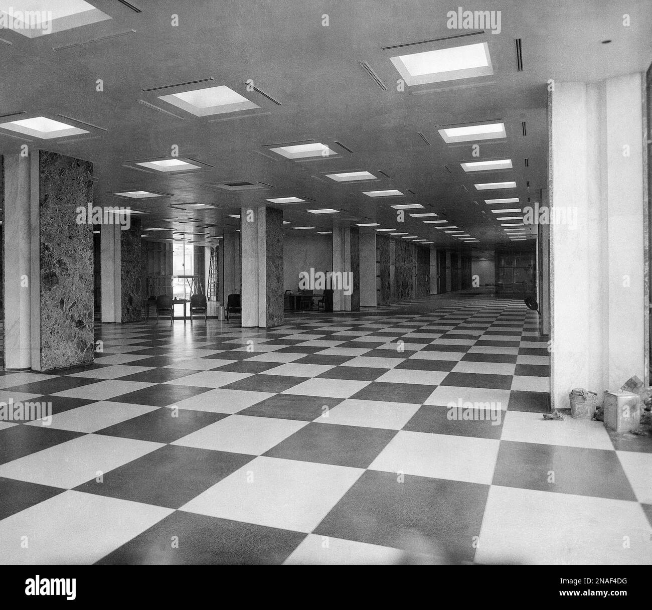General view of the approach through the lobby heading for elevator ...