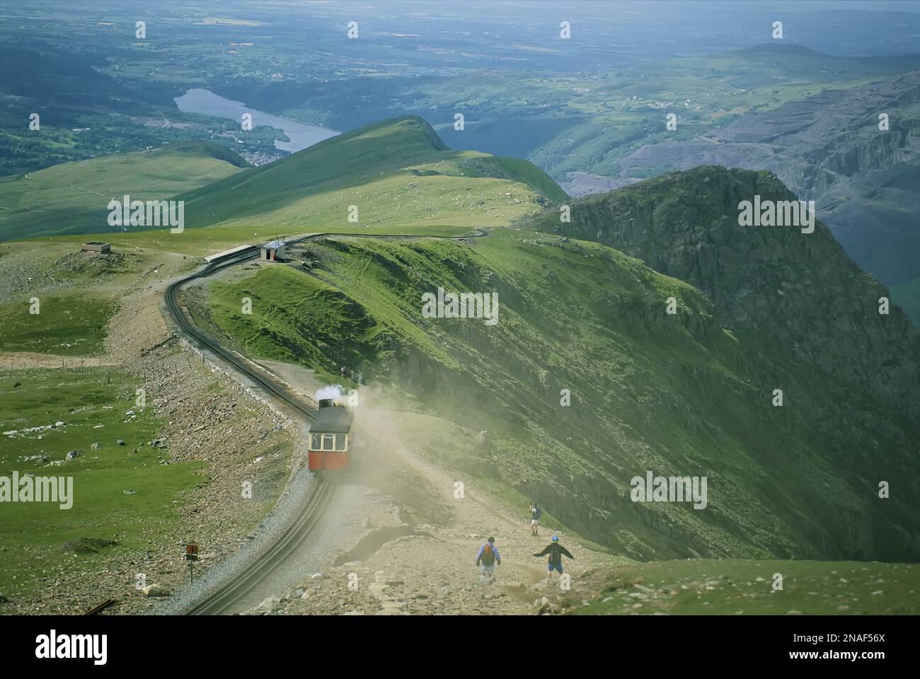 Train carrying tourists chugs up Mount Snowdon in Wales, England; Mount ...