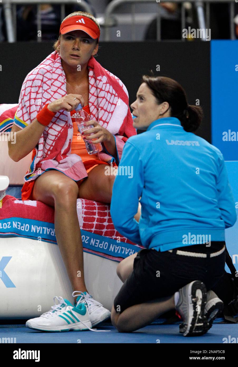 Slovakia's Daniela Hantuchova receives treatment from a trainer during ...