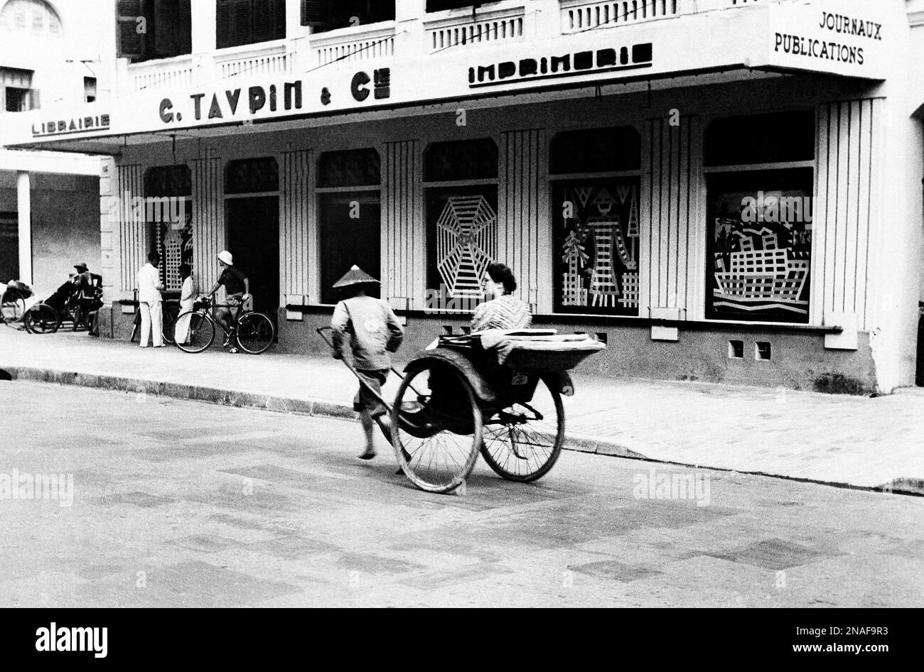 This shopkeeper in Hanoi in December 12, 1930, was confronted with the ...