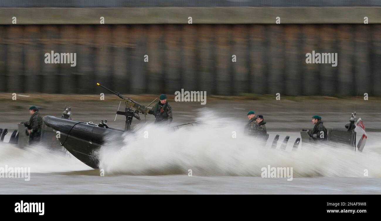 British Royal Marines in inflatable ribs take part during a combined ...