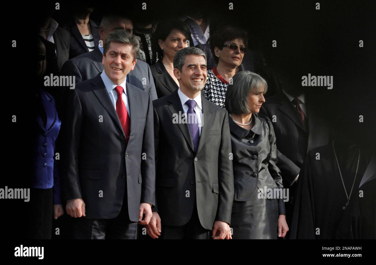 Newly elected Bulgarian president Rosen Plevneliev, right, smiles next ...