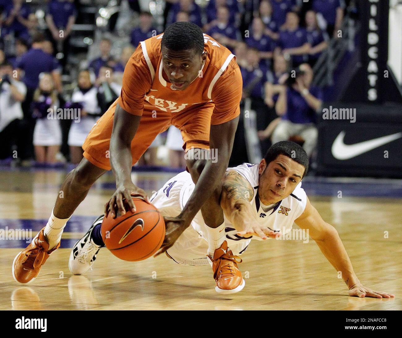 Kansas State guard Angel Rodriguez, right, tries to steal the ball from ...