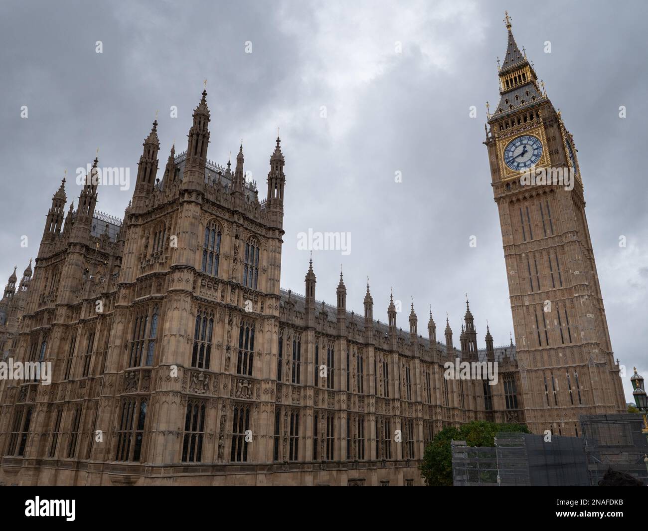 A Big Ben clock tower surrounded by buildings in London Stock Photo - Alamy