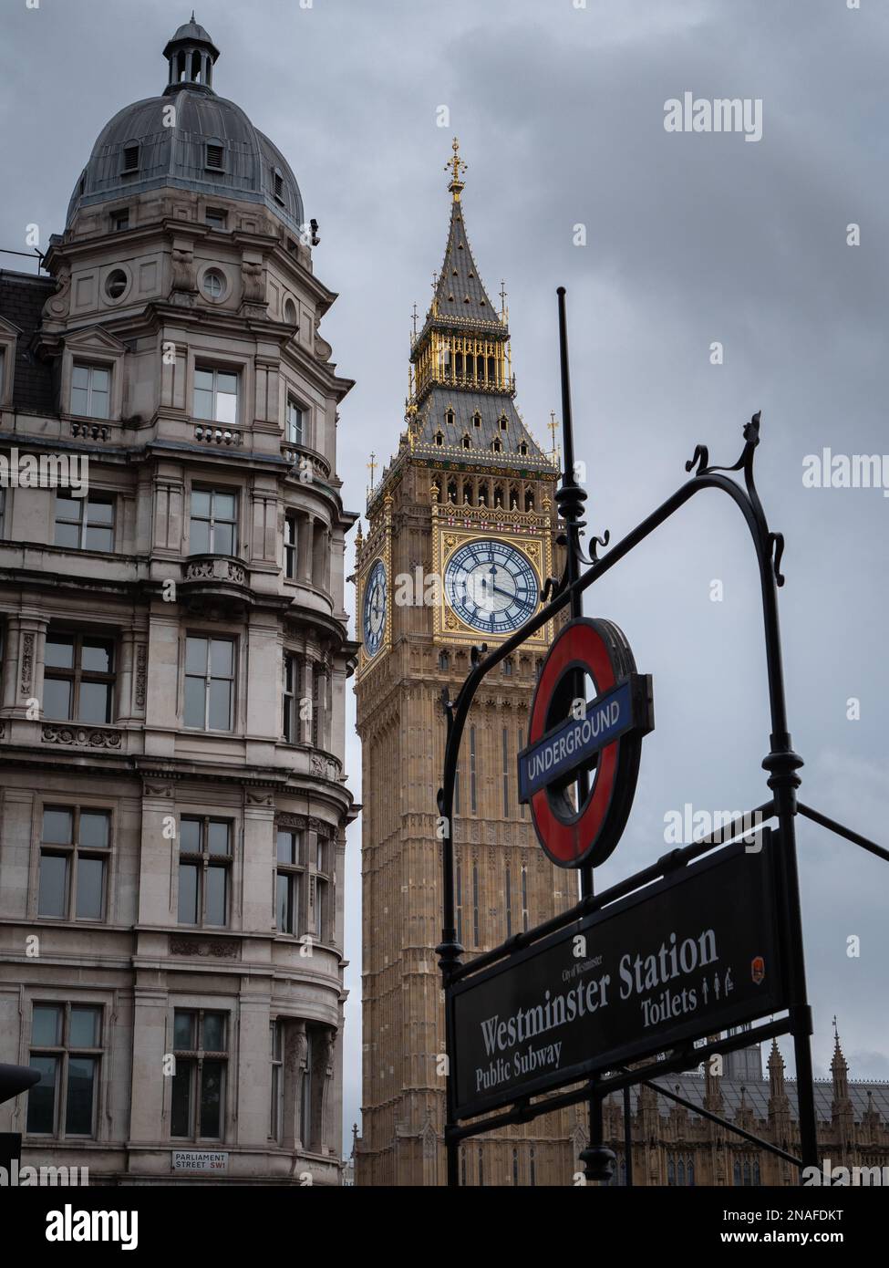 A Big Ben clock tower surrounded by buildings in London Stock Photo - Alamy