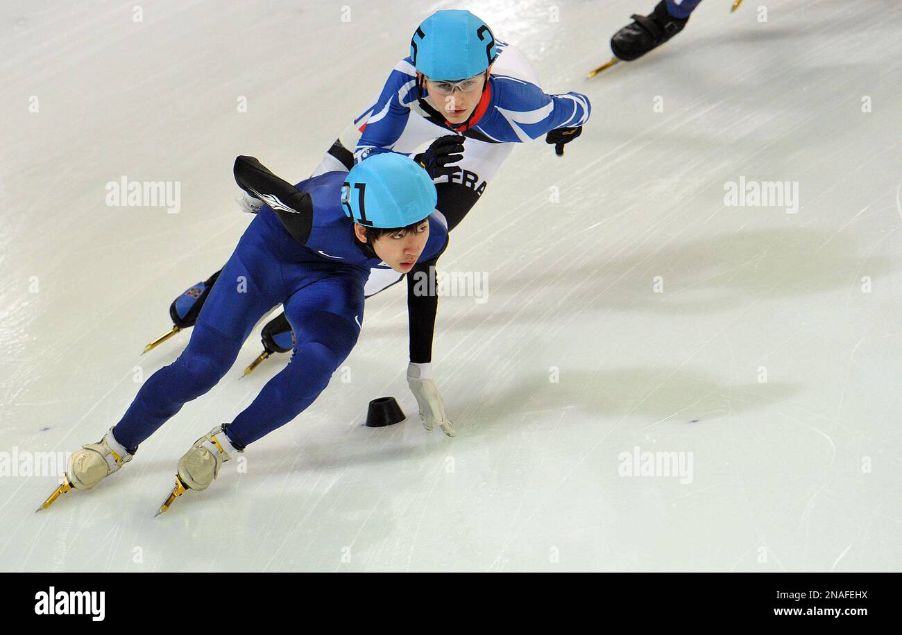 Korea's Lim Hyo Jun, left, and France's Yoann Martinez compete in the ...