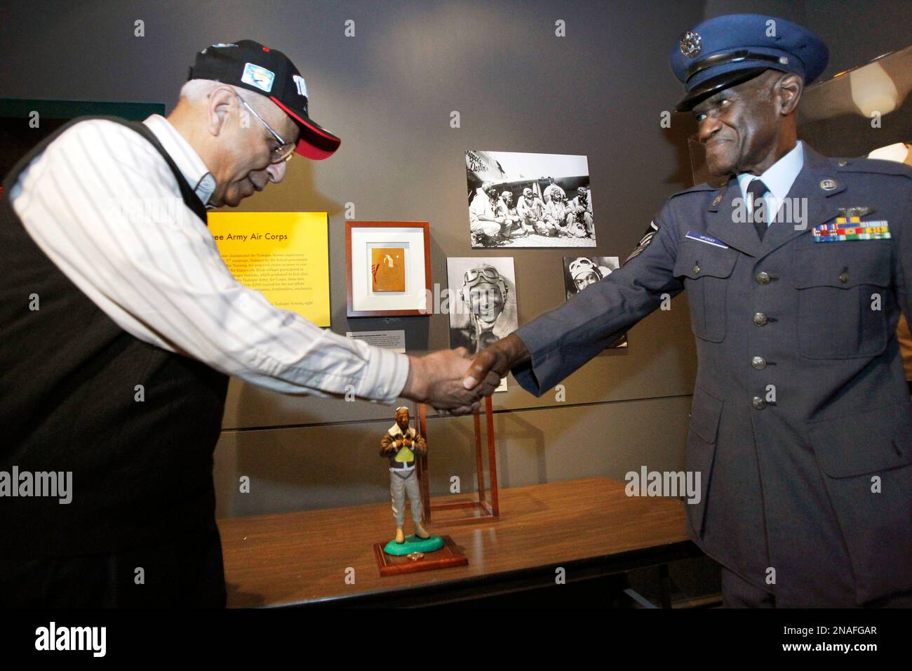Dr. Harry Lanauze, left, a former Tuskegee Fighter Pilot who flew a P40 ...