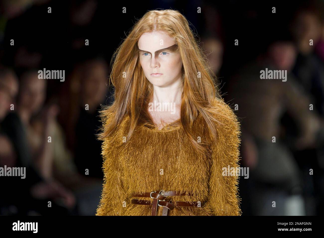 A model presents a creation by fashion brand Rebekka Ruetz at the ...