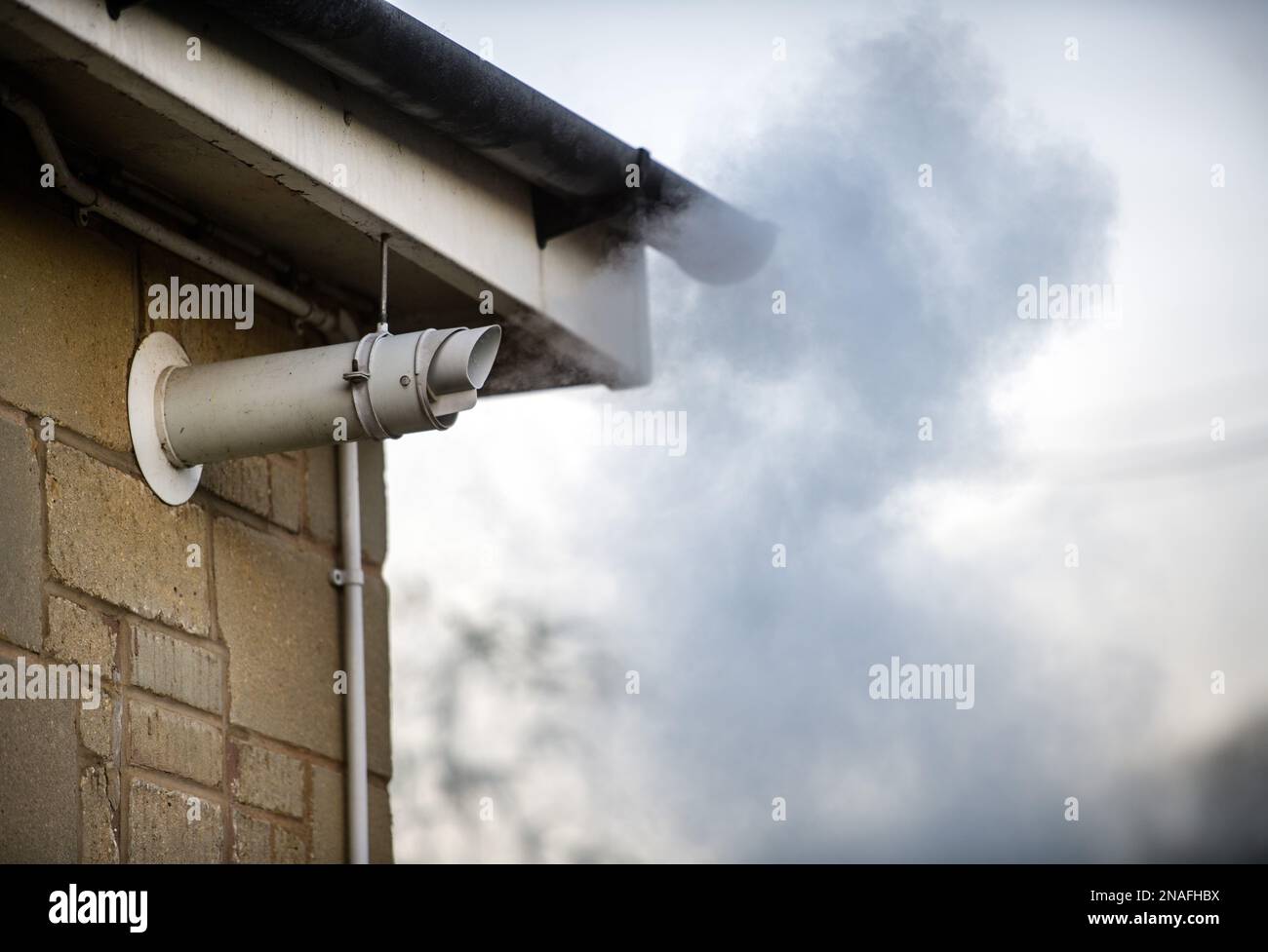 A gas boiler flue vent Stock Photo - Alamy
