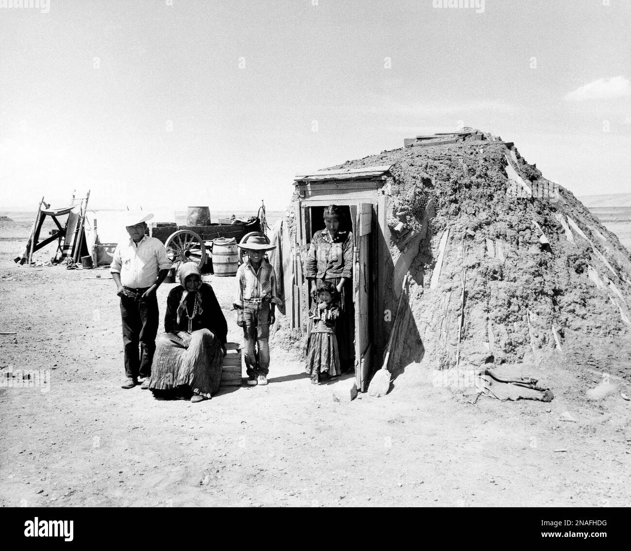 The traditional hogan - one round room of logs and mud with a smoke ...