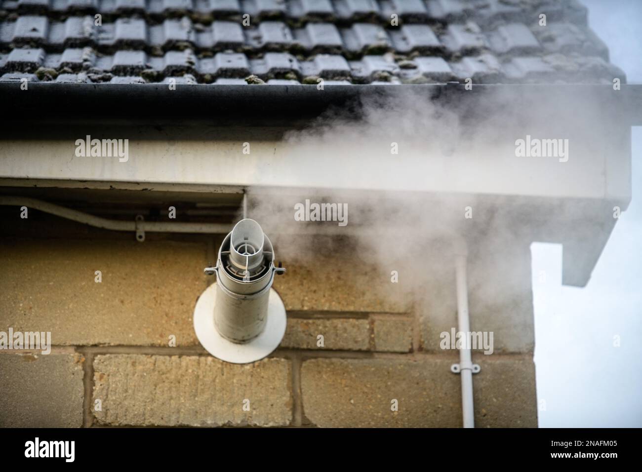 A gas boiler flue vent Stock Photo - Alamy
