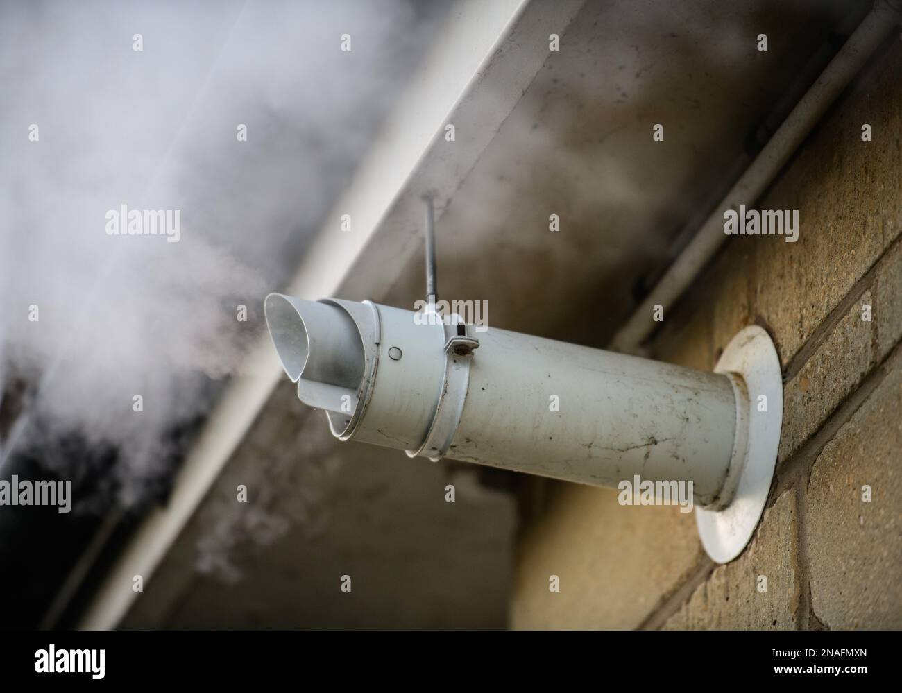 A gas boiler flue vent Stock Photo - Alamy