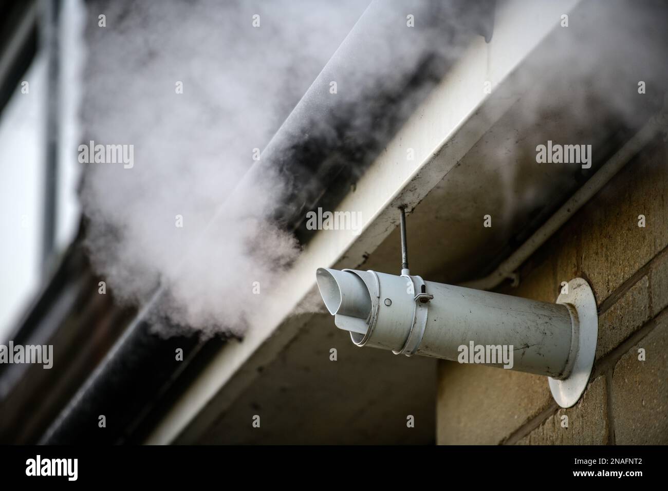 A gas boiler flue vent Stock Photo - Alamy