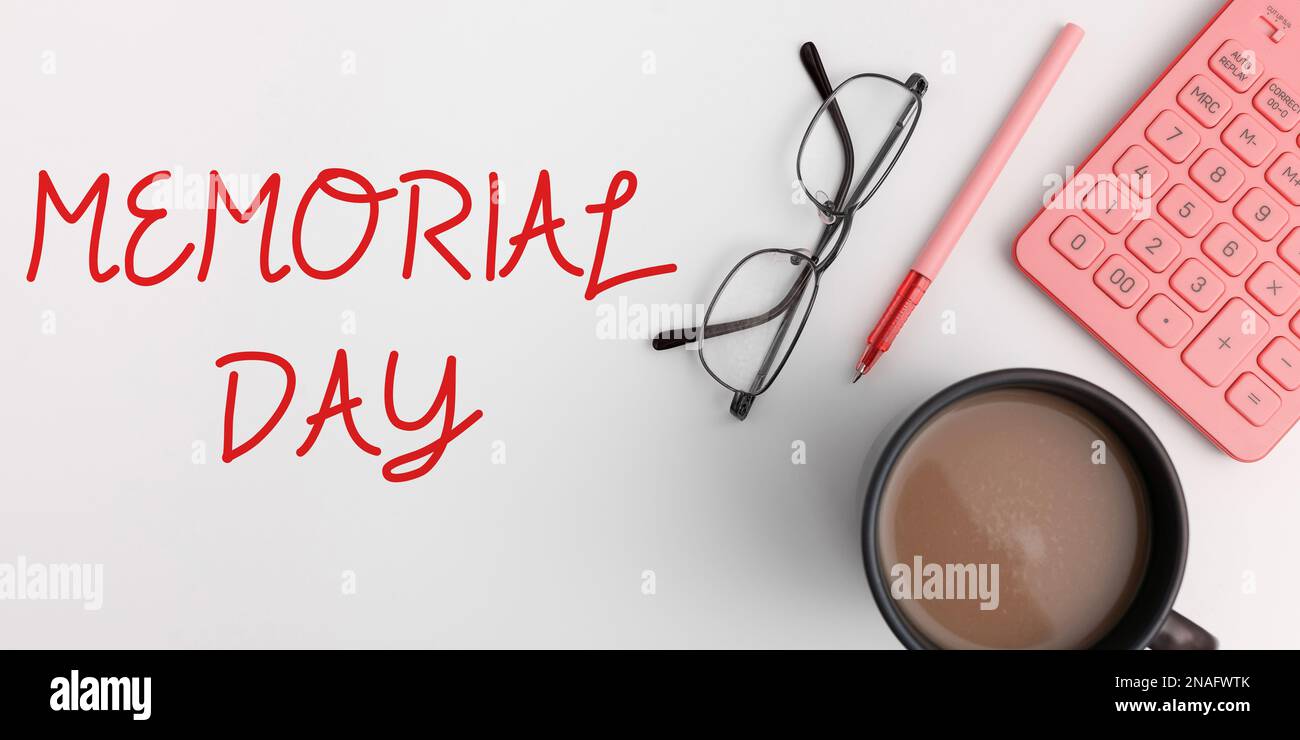 Hand writing sign Memorial Day. Word Written on To honor and ...