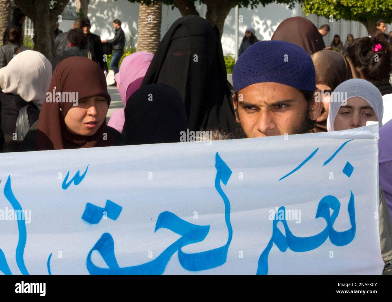 Ultraconservative Muslims known as Salafists hold a banner reading ...
