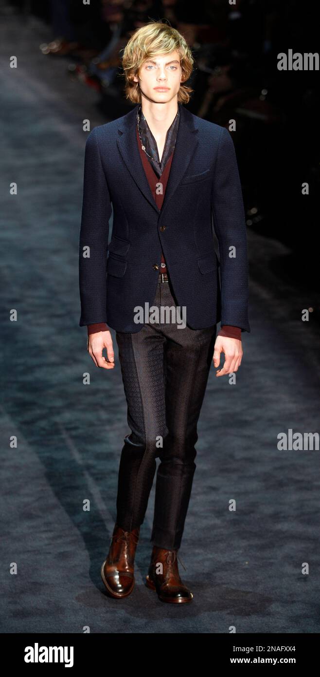 A model wears a creation from the Gucci men's Fall-Winter 2012/2013 ...