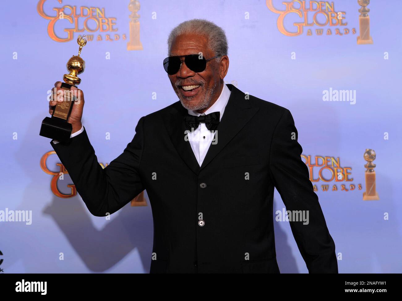 Actor Morgan Freeman poses backstage with the Cecil B. Demille Award ...