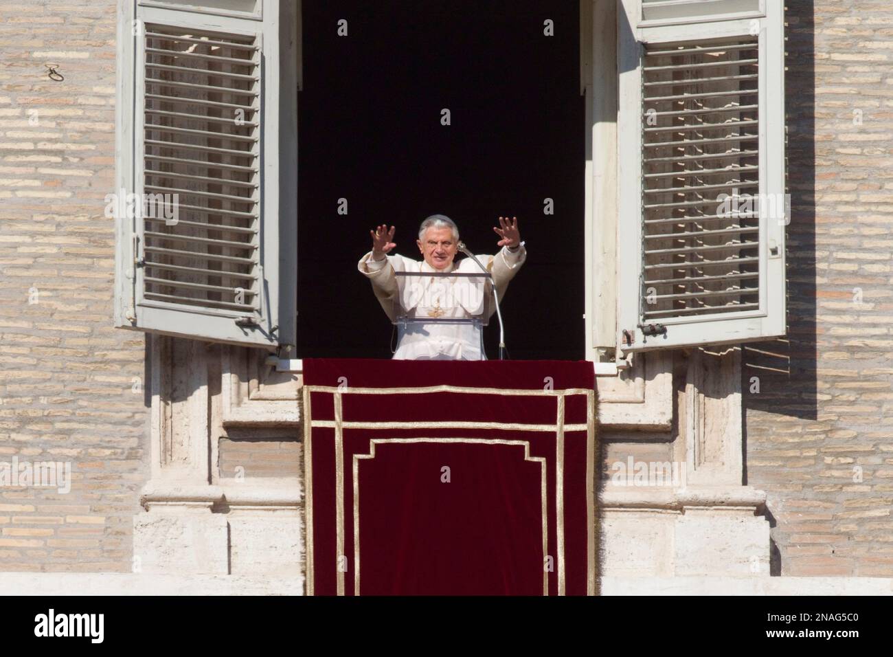 Pope Benedict XVI delivers his blessing during the Angelus noon prayer ...