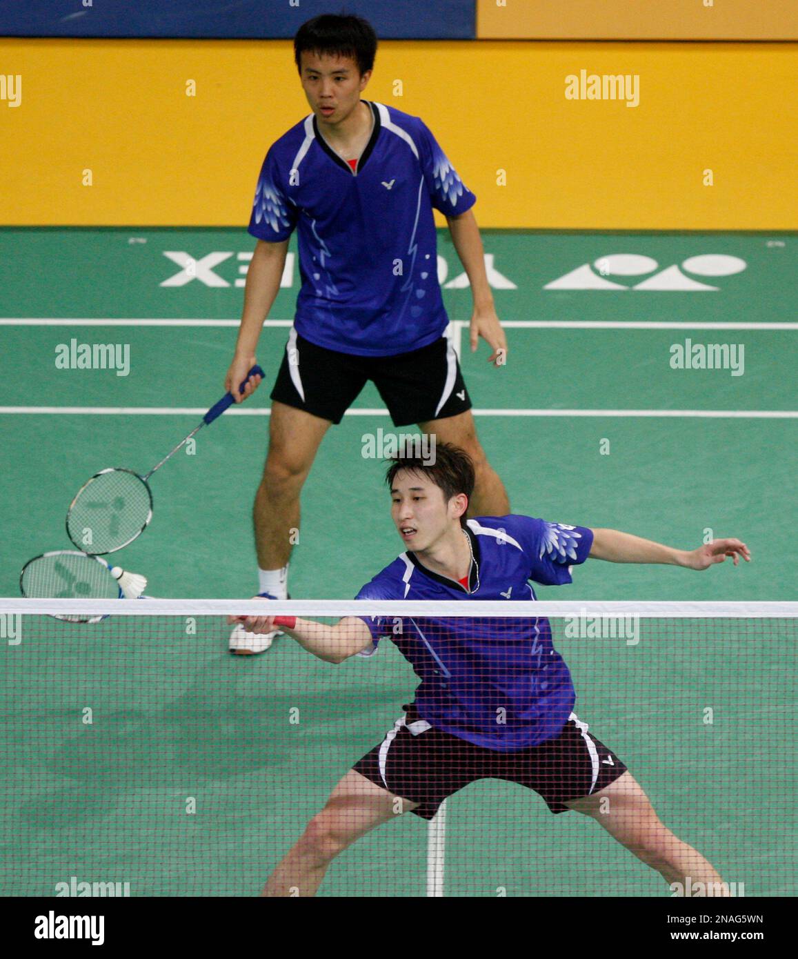Taiwan's Lee Sheng Mu, front, returns a shot against South Korea's Cho ...