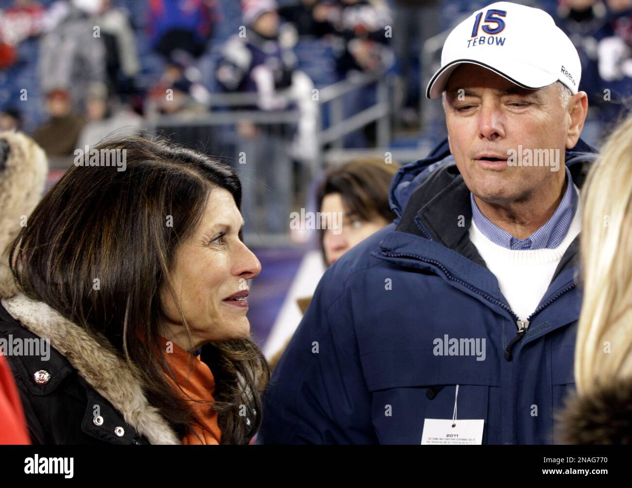 Denver Broncos quarterback Tim Tebow's mother Pam and father Bob stand ...