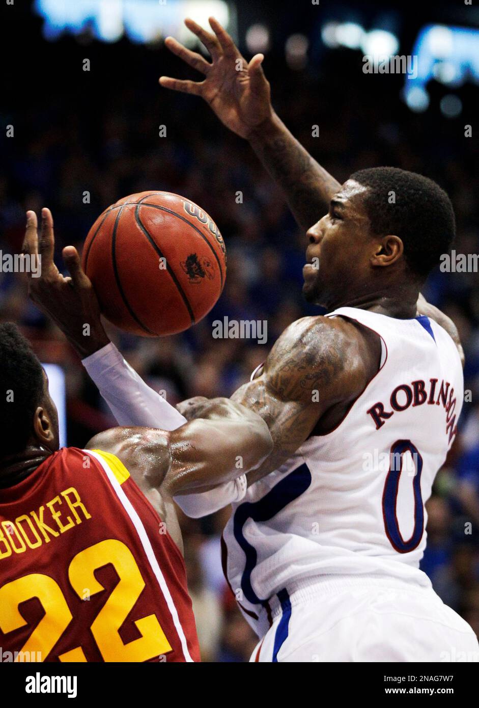 Iowa State forward Anthony Booker (22) fouls Kansas forward Thomas ...