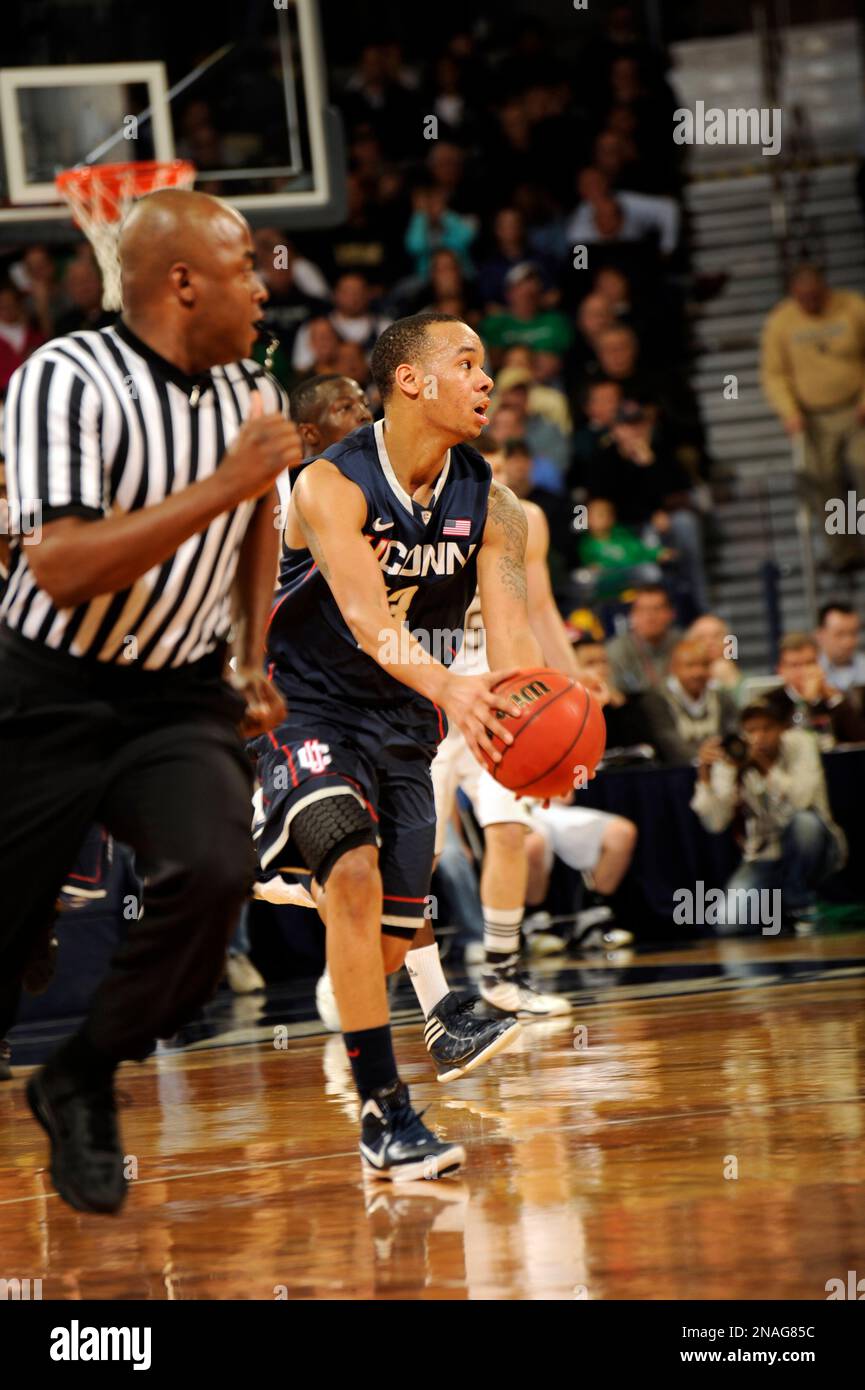 Connecticut guard Shabazz Napier throws a pass upo court in an NCAA ...