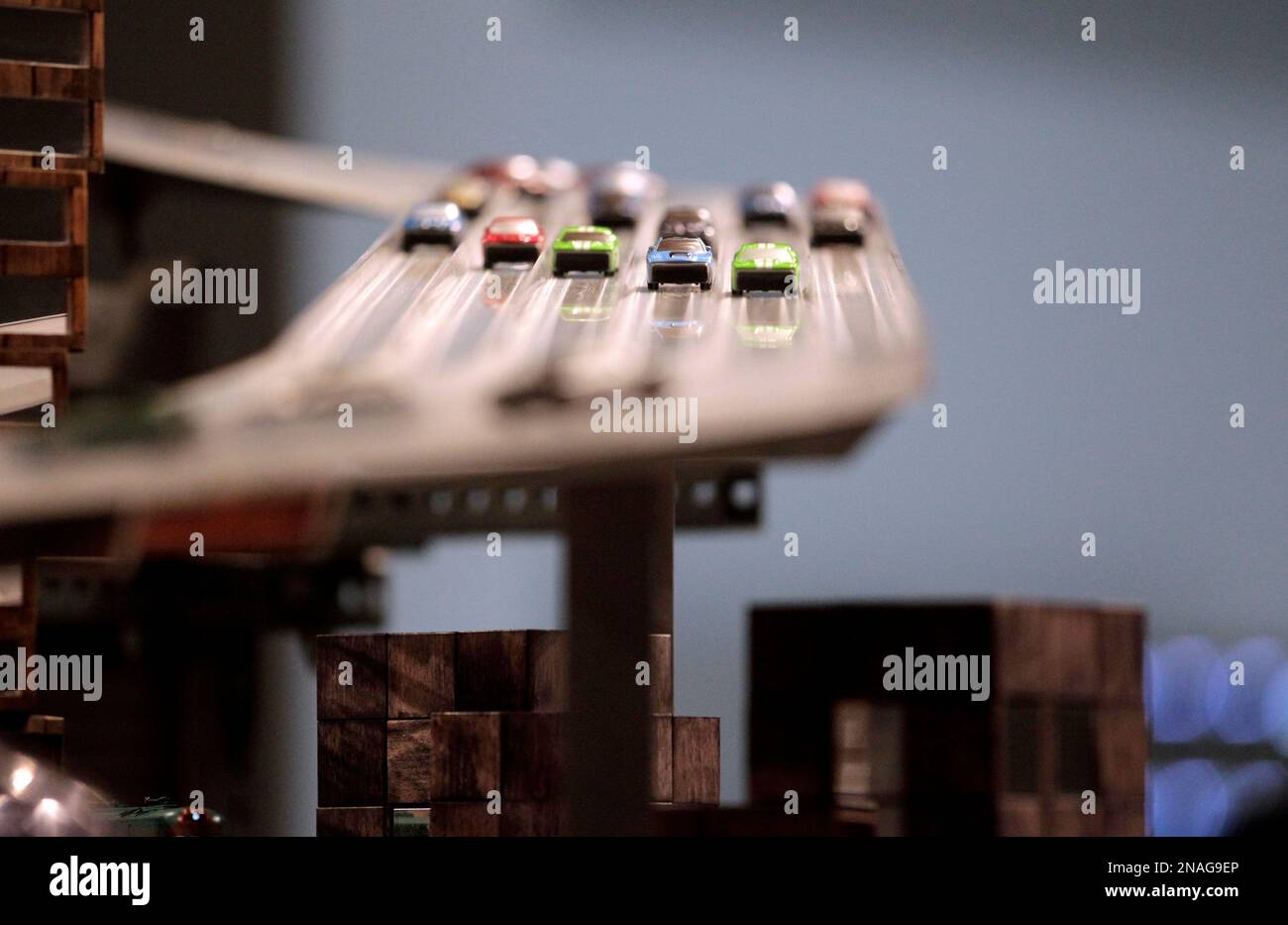 Miniature cars move along the road in Chris Burden's latest kinetic ...