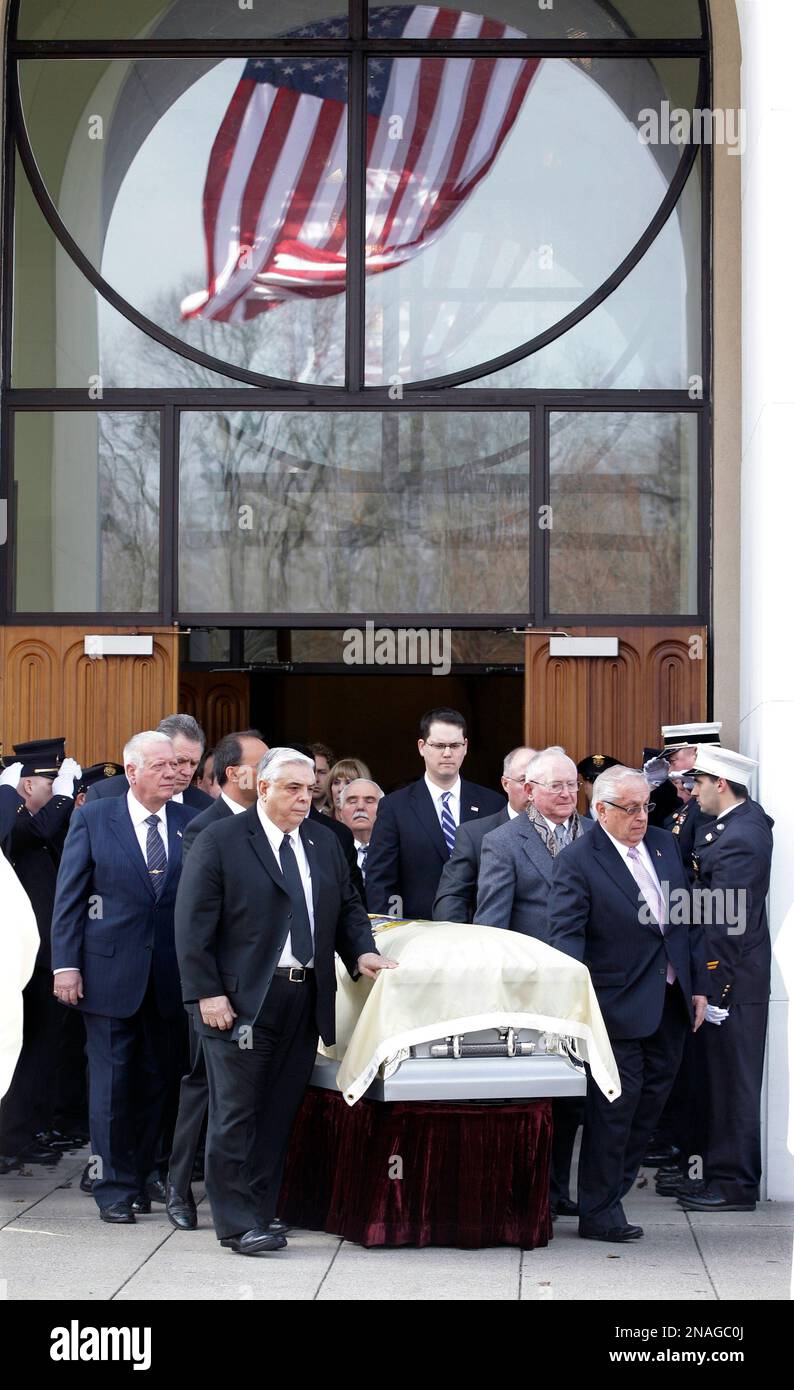 The casket of New Jersey Assemblyman Alex DeCroce is brought from St ...