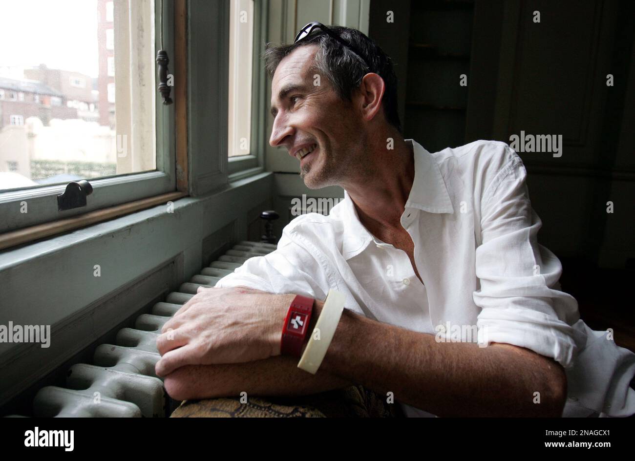 Belgian-born artist Francis Alys looks out of the window at his 'Seven ...