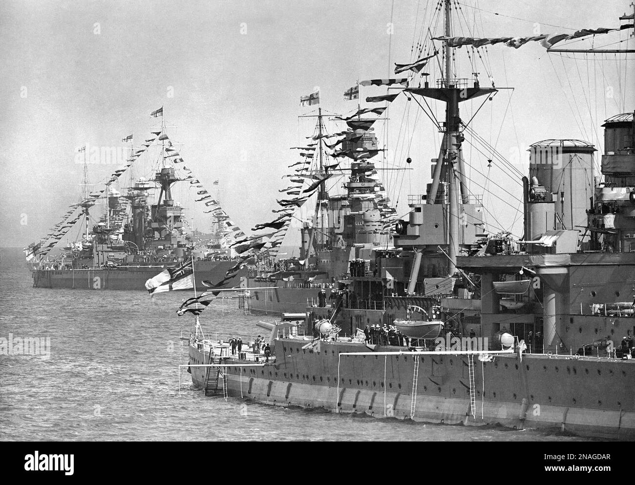 A view of the HMS Renown, foreground, followed by more battleships ...