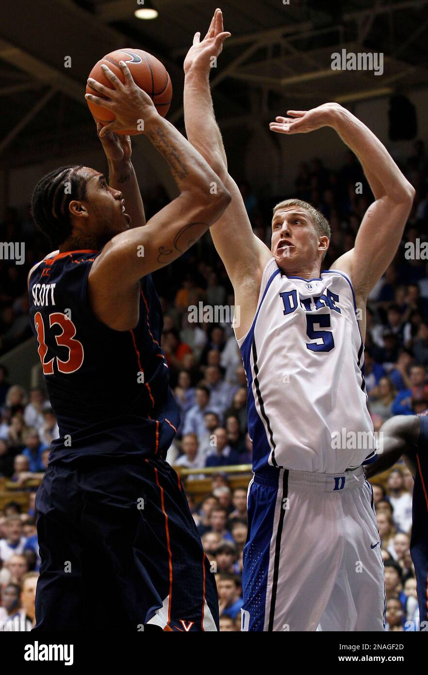 Duke's Mason Plumlee (5) tries to block Virginia's Mike Scott (23) as ...