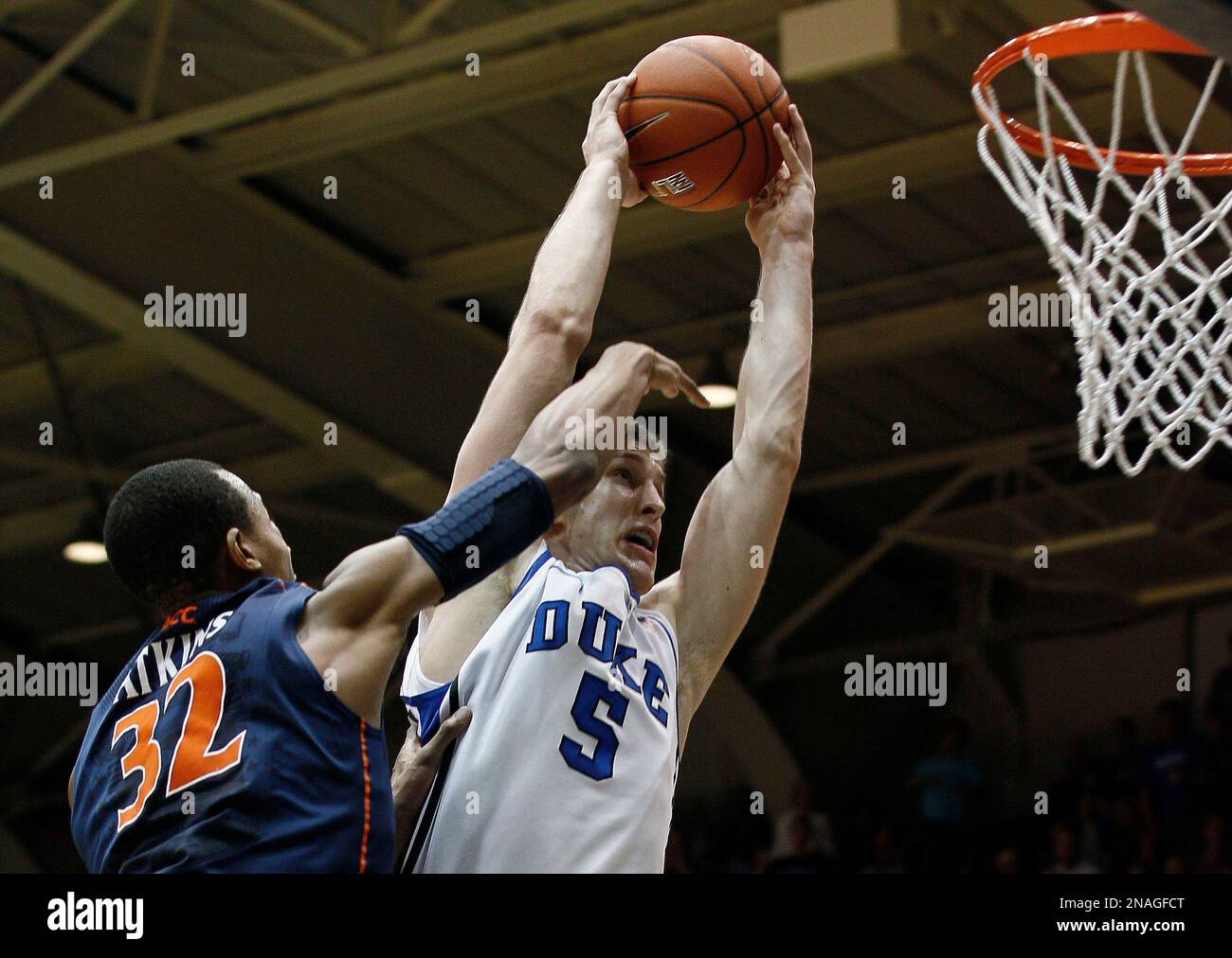 Duke's Mason Plumlee (5) goes up to the basket against Virginia's ...
