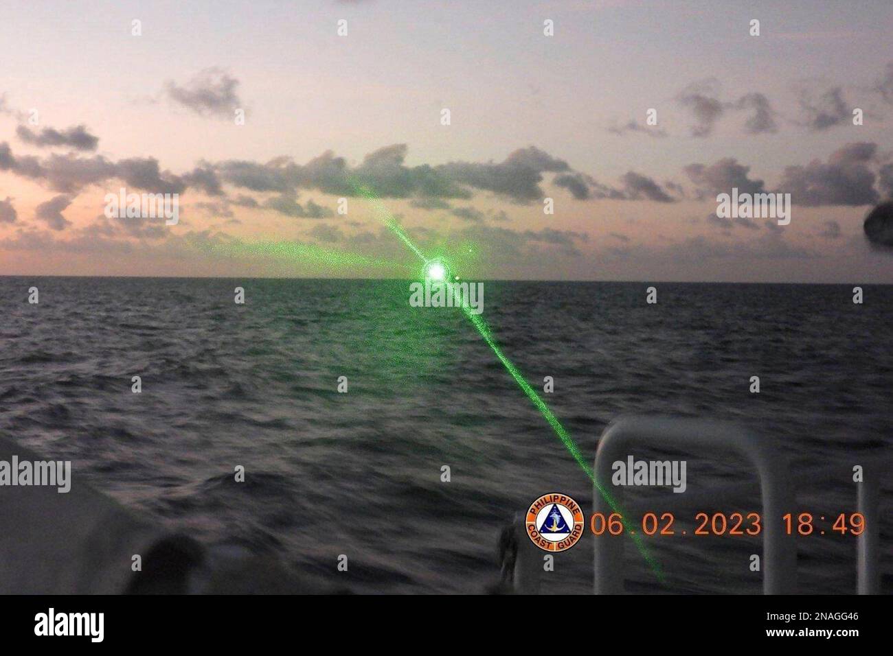 This photo provided by the Philippine Coast Guard shows a green ...