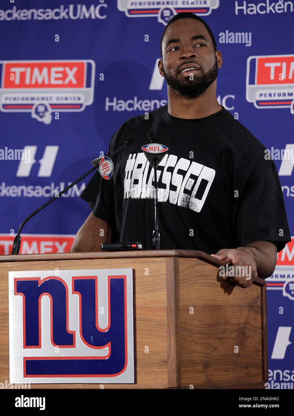 New York Giants defensive end Justin Tuck talks to the media during NFL ...