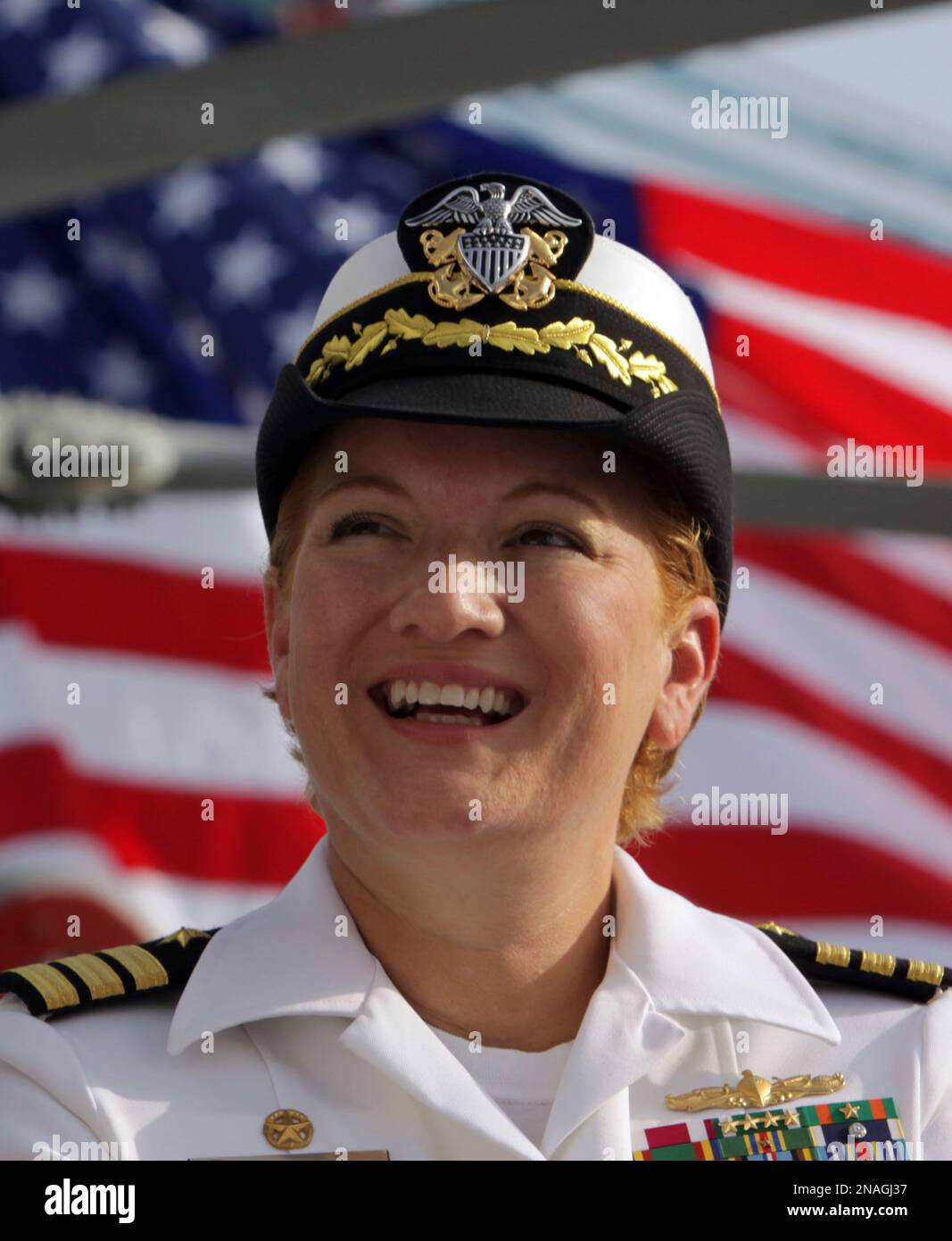 U.S. Navy Cmdr. Jennifer Ellinger, commander of the destroyer USS Kidd ...