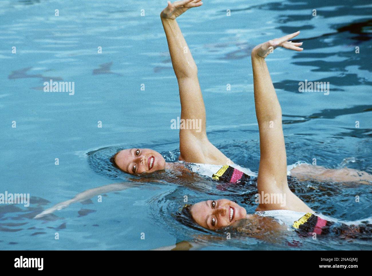 Synchronized swimmers and twins Karen, foreground, and Sarah Josephson ...